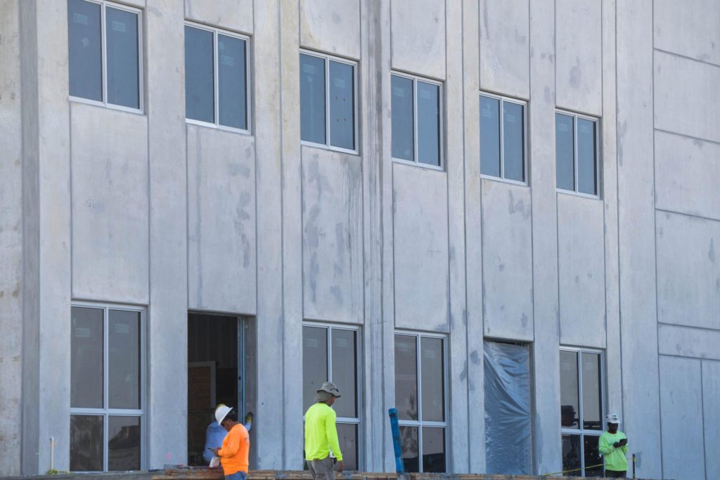 Impact Window installation of CGI Windows & Doors Building